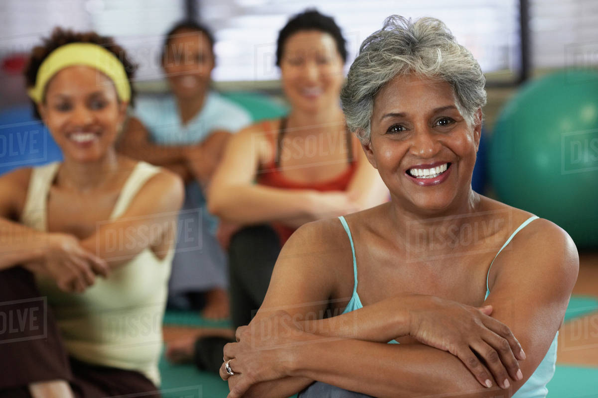 Multi-ethnic women in exercise class - Royalty-free Stock Photo | Dissolve