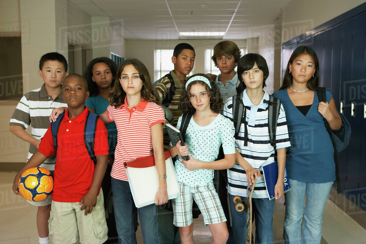 Group of multi-ethnic students in hallway - Royalty-free Stock Photo ...