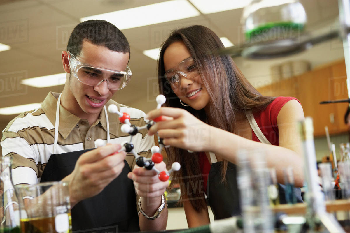 Multi-ethnic teenagers in science class - Royalty-free Stock Photo ...
