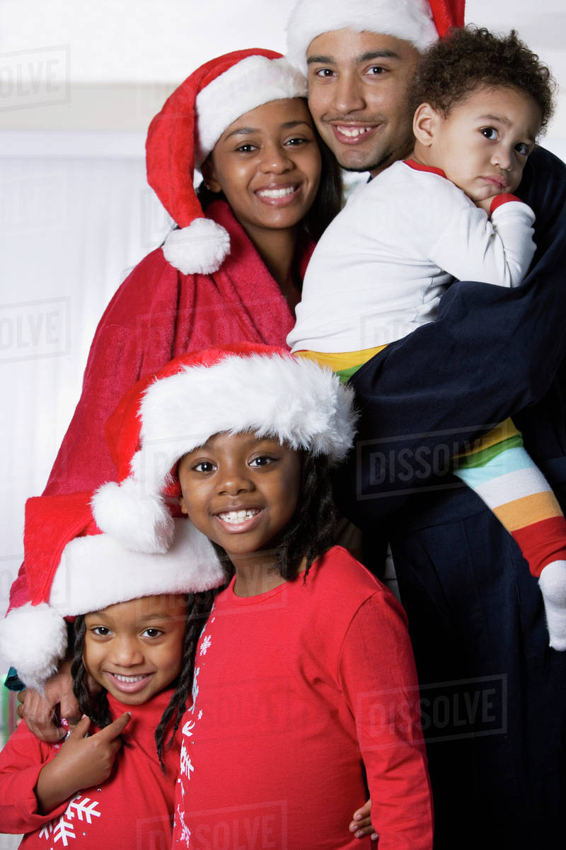 African family hugging on Christmas - Stock Photo - Dissolve