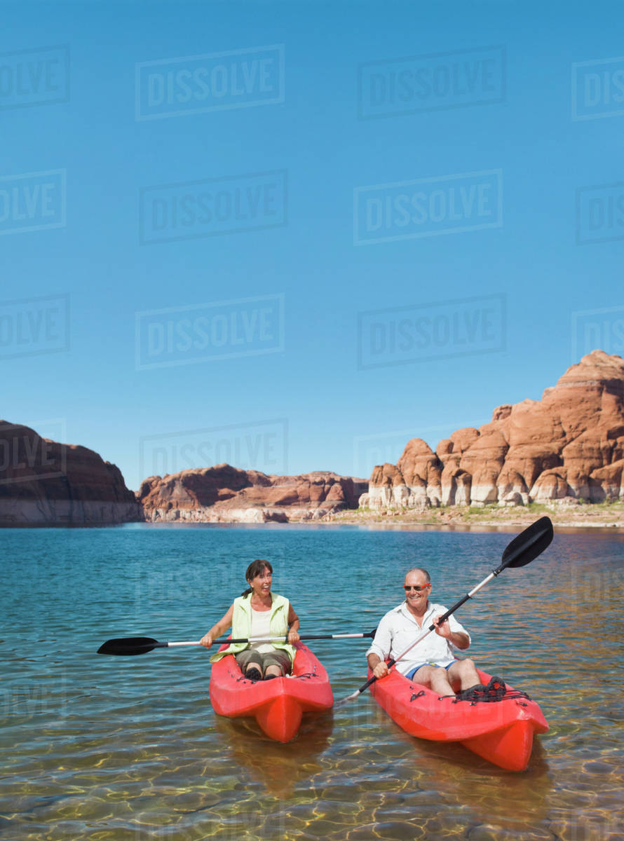 Multi-ethnic seniors kayaking - Royalty-free Stock Photo | Dissolve
