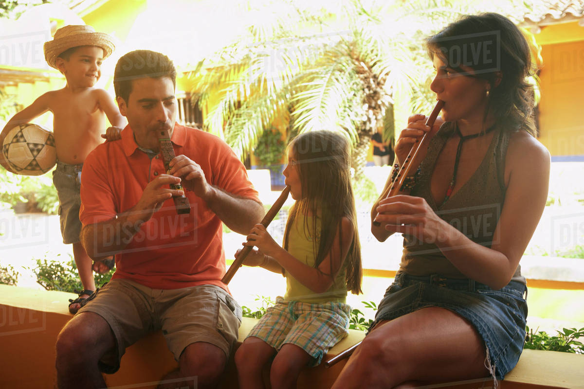 Family playing musical instruments - Royalty-free Stock Photo | Dissolve