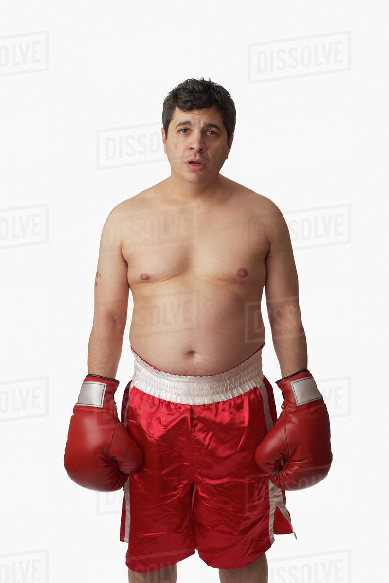 Portrait of overweight boxer - Stock Photo - Dissolve