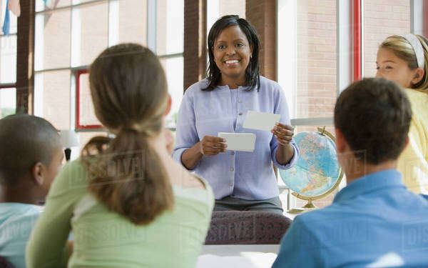Teacher asking students questions - Royalty-free Stock Photo | Dissolve