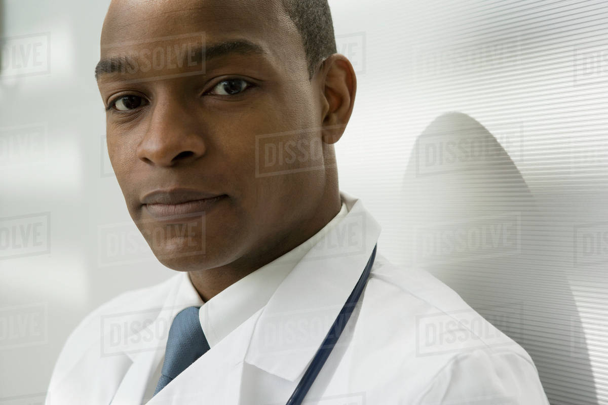 Close up of African doctor looking serious - Royalty-free Stock Photo ...