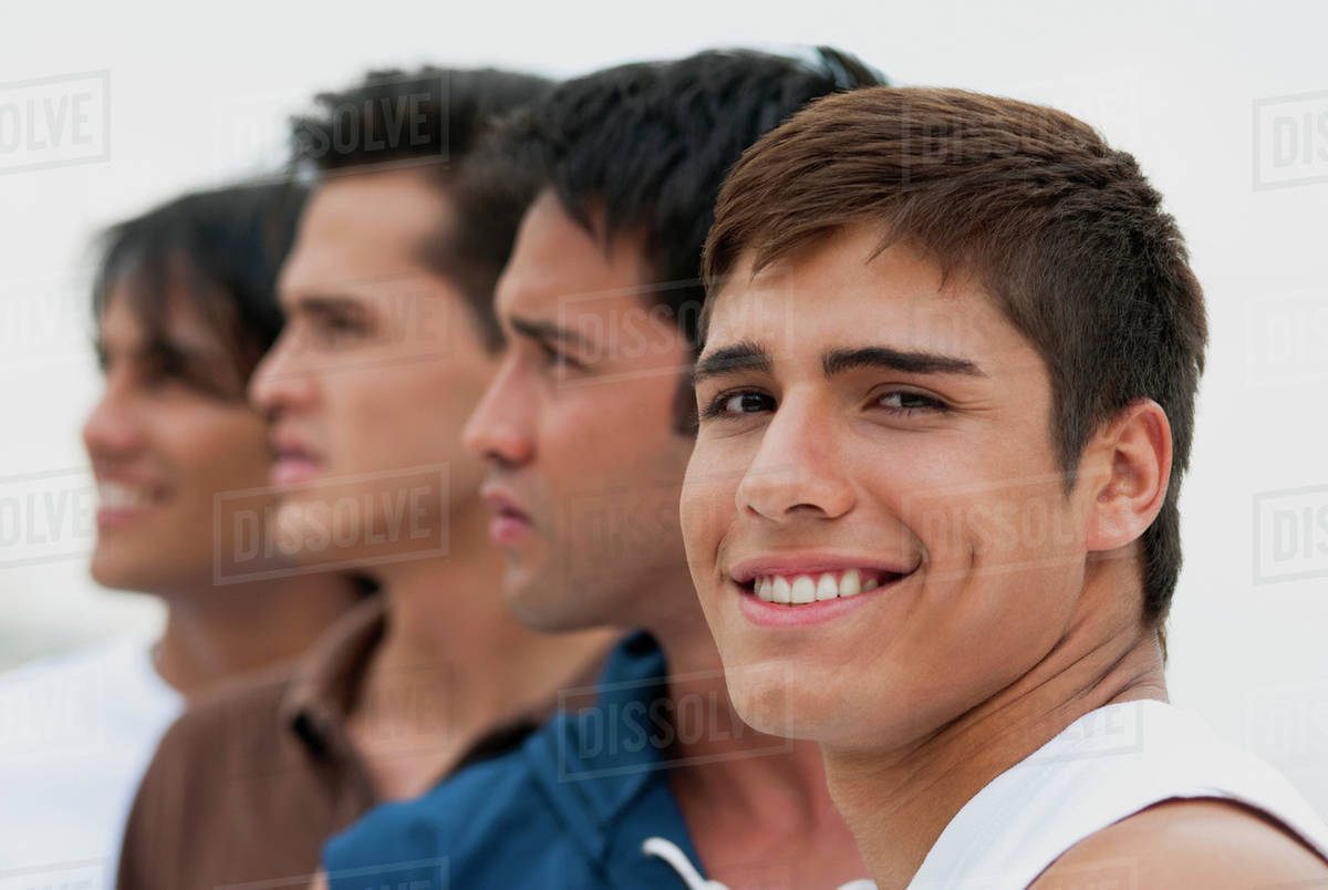 Friends standing in a row - Royalty-free Stock Photo | Dissolve