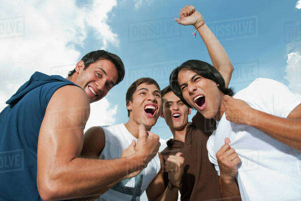 Friends cheering together - Royalty-free Stock Photo | Dissolve