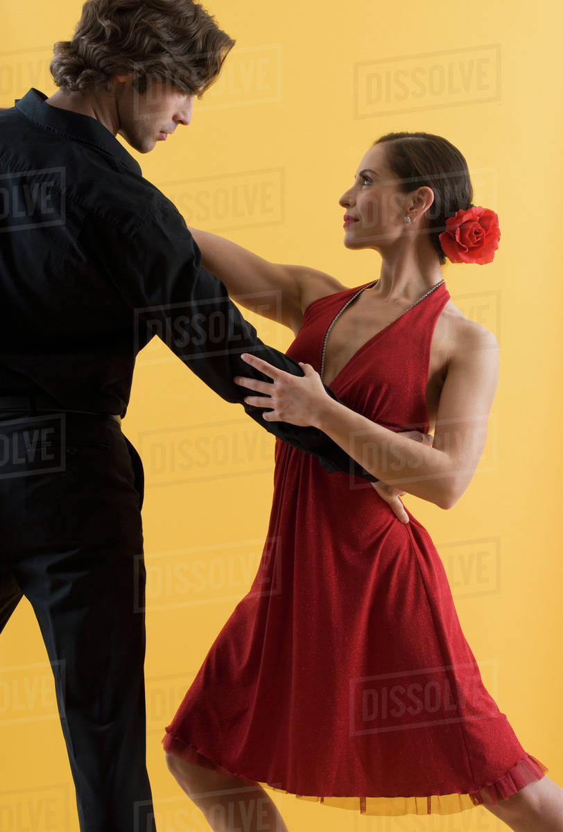 Hispanic couple dancing - Royalty-free Stock Photo | Dissolve