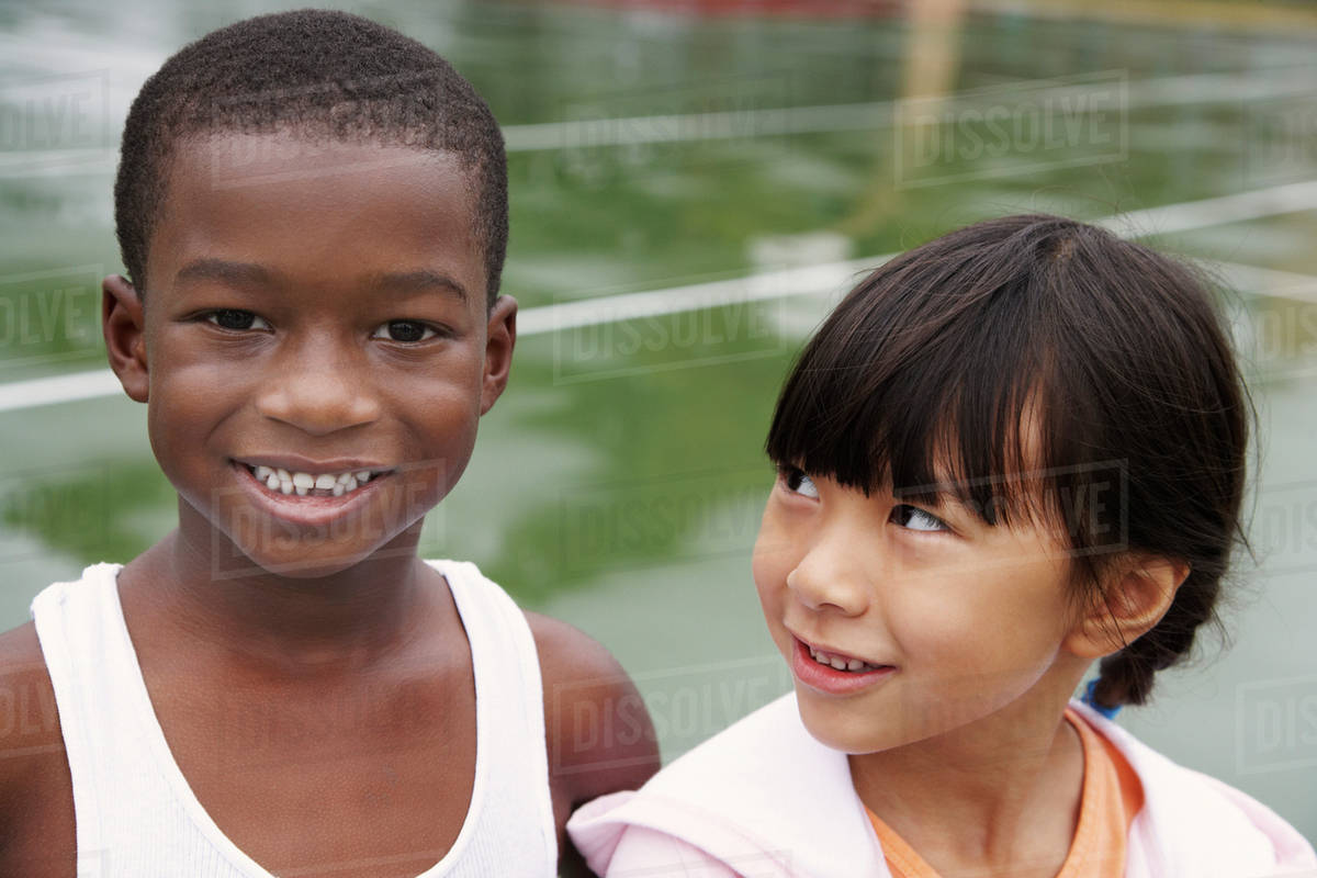 Multi-ethnic children on playground - Royalty-free Stock Photo | Dissolve