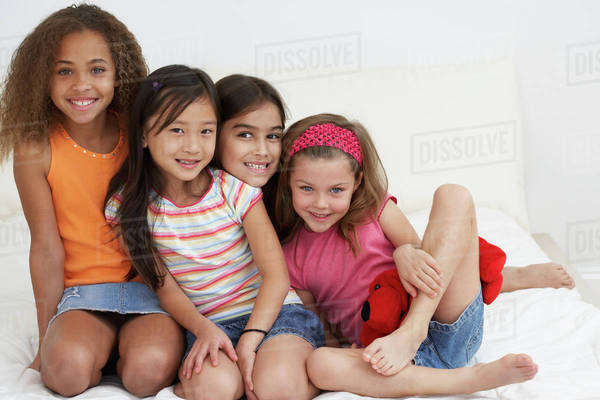 Group of young girls hugging and smiling - Royalty-free Stock Photo ...