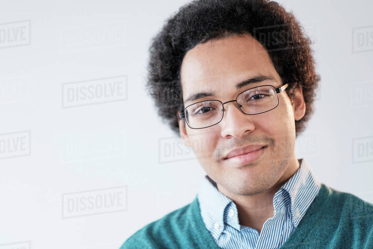 Mixed race man smiling - Royalty-free Stock Photo | Dissolve
