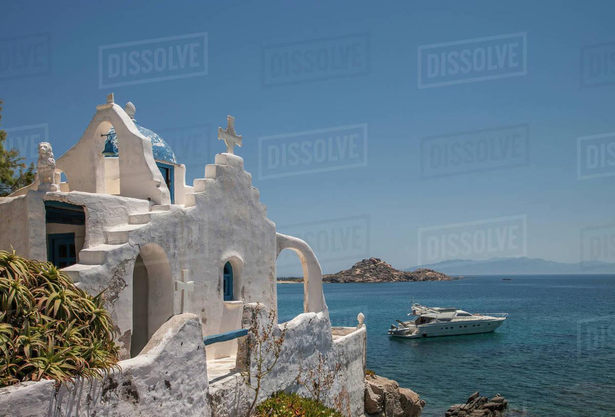 Traditional building on oceanside cliff - Stock Photo - Dissolve