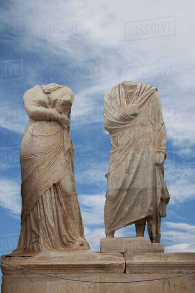 Low angle view of dilapidated statue ruins - Stock Photo - Dissolve
