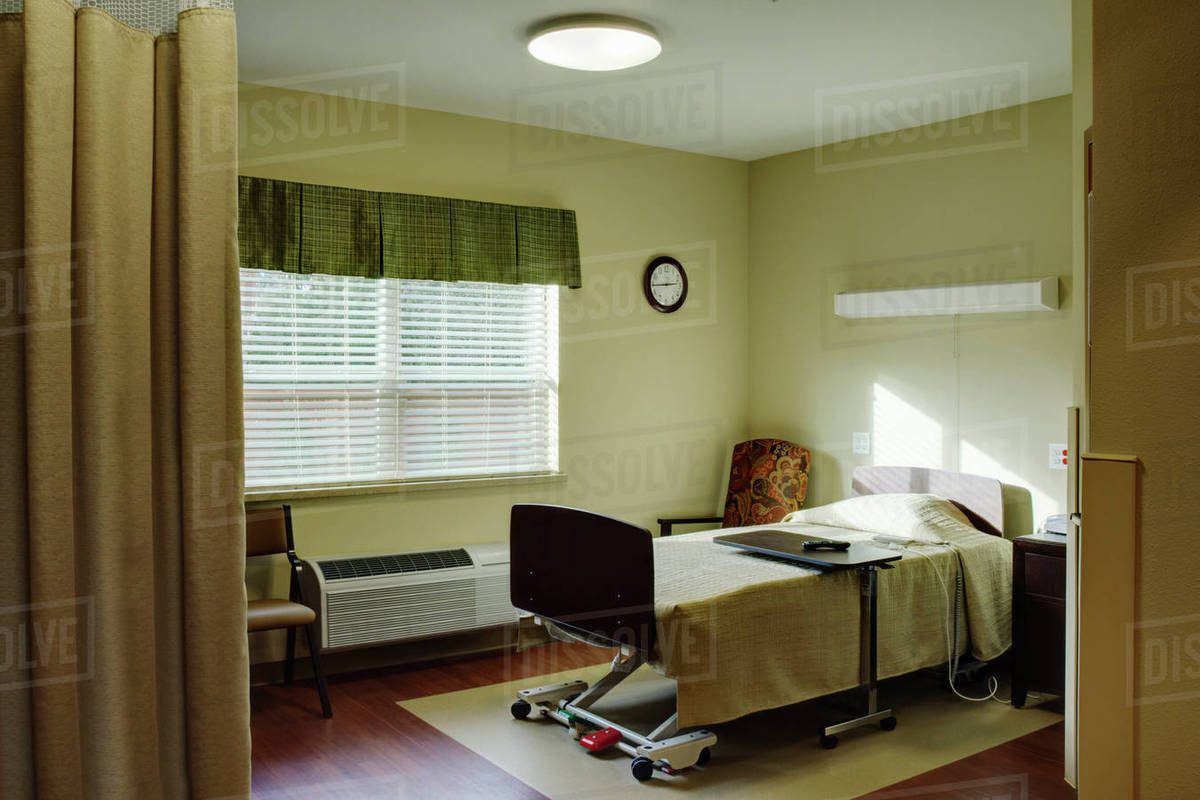 Empty patient room in assisted living facility - Stock Photo - Dissolve