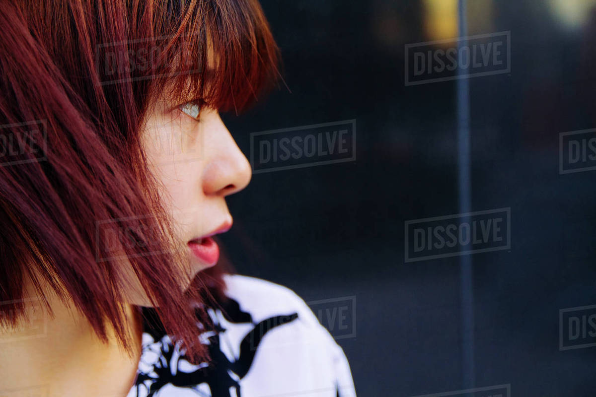 Close up of profile of Chinese woman - Royalty-free Stock Photo | Dissolve