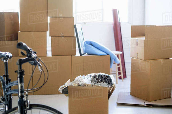 Cardboard boxes in new home - Royalty-free Stock Photo | Dissolve
