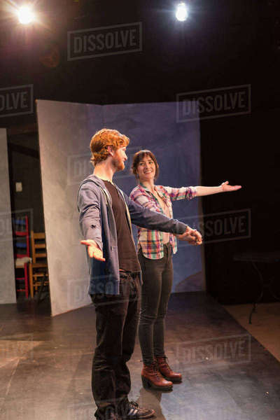 Actors rehearsing on theater stage - Stock Photo - Dissolve