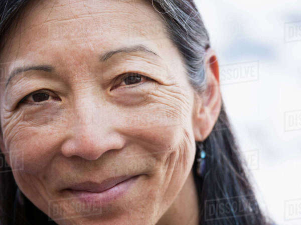 Close up of face of smiling Japanese woman - Royalty-free Stock Photo ...