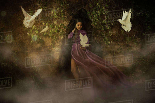 White doves flying around Chinese woman - Royalty-free Stock Photo ...