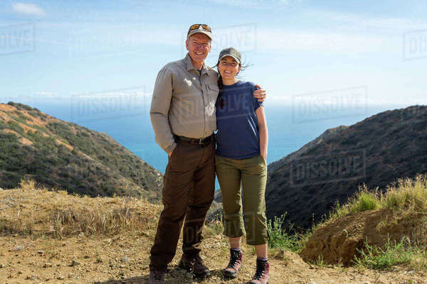 Caucasian man and daughter hugging on mountain - Royalty-free Stock ...