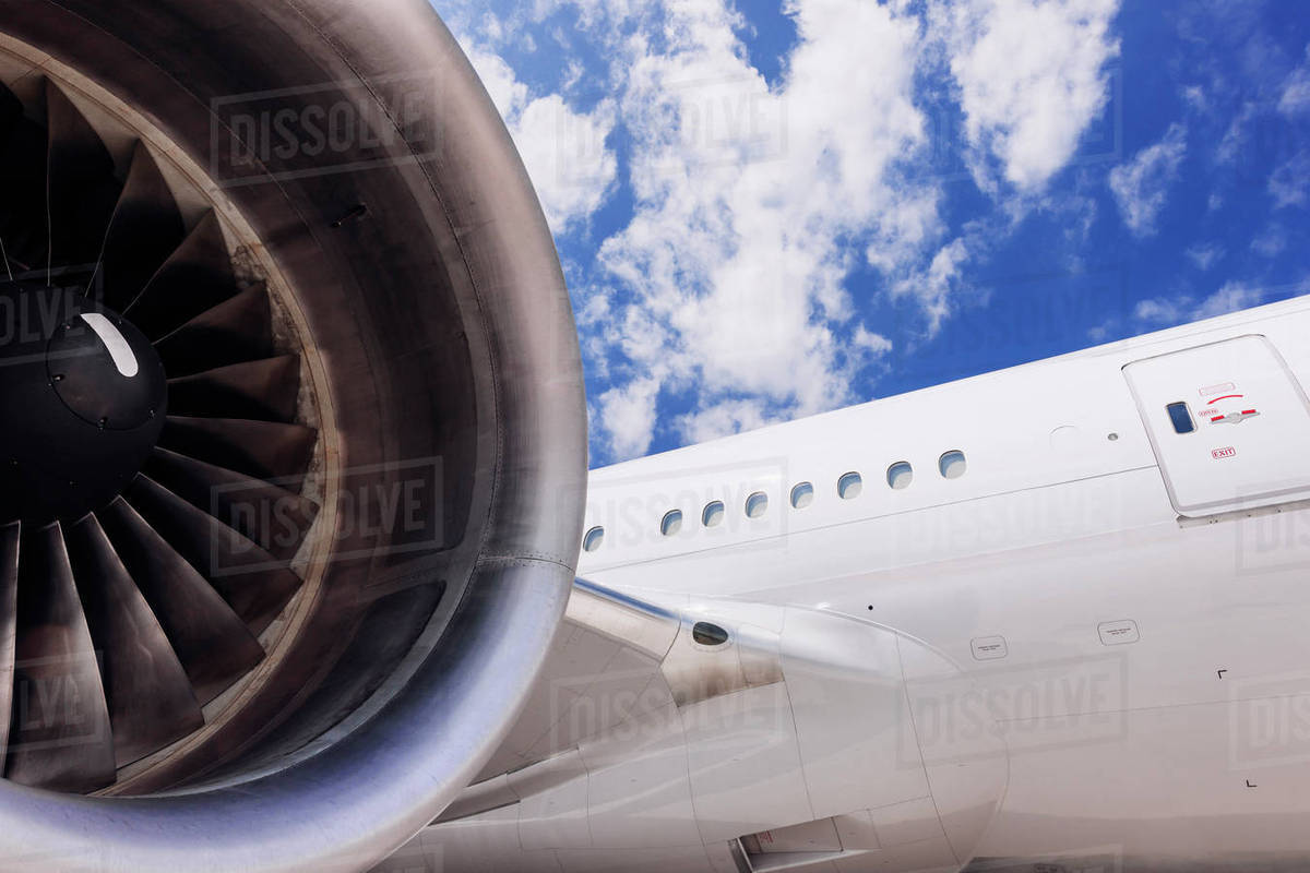 Wing and engine on airplane - Royalty-free Stock Photo | Dissolve
