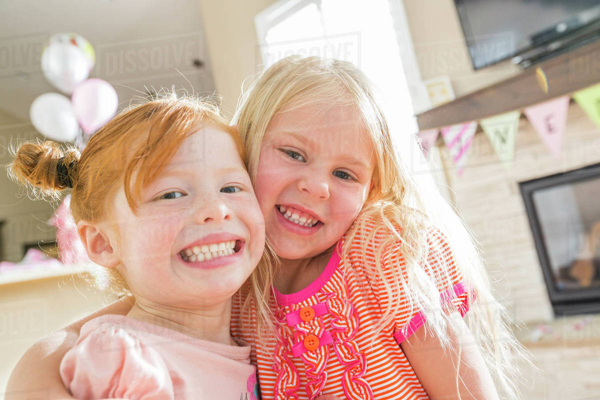 Caucasian girls smiling cheek to cheek - Royalty-free Stock Photo ...