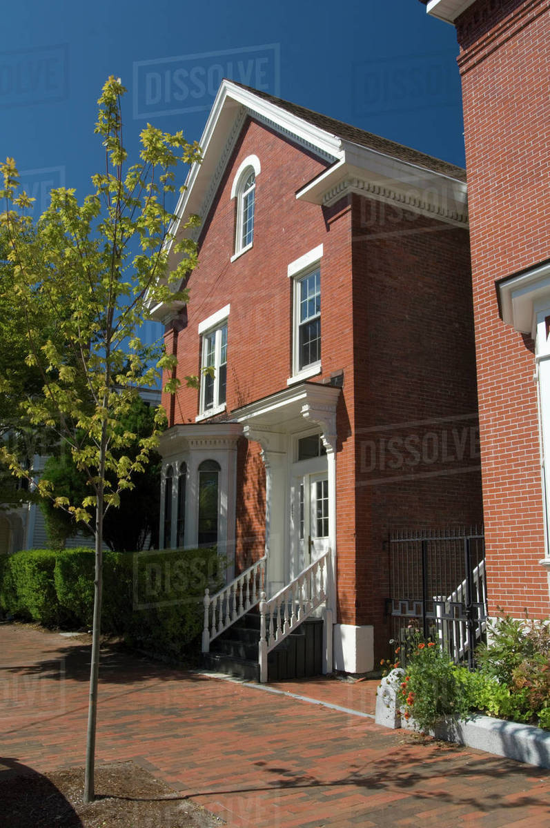 Traditional brick home - Royalty-free Stock Photo | Dissolve