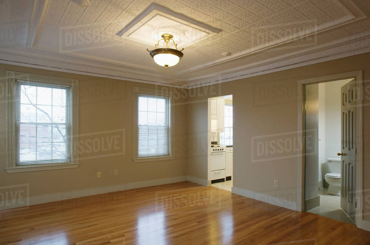 Empty room in apartment with hardwood floor - Royalty-free Stock Photo ...