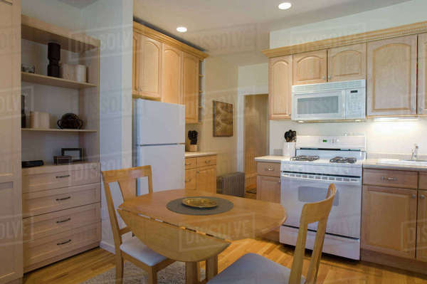 Kitchen in studio apartment - Royalty-free Stock Photo | Dissolve