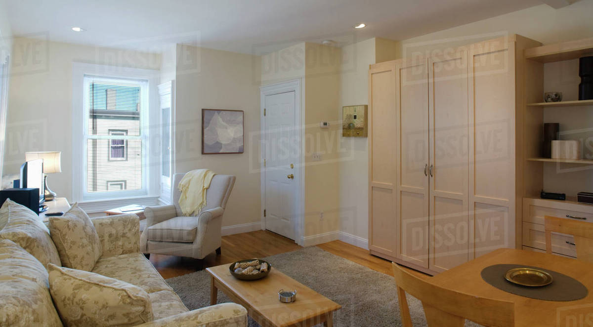 Murphy bed in studio apartment - Royalty-free Stock Photo | Dissolve