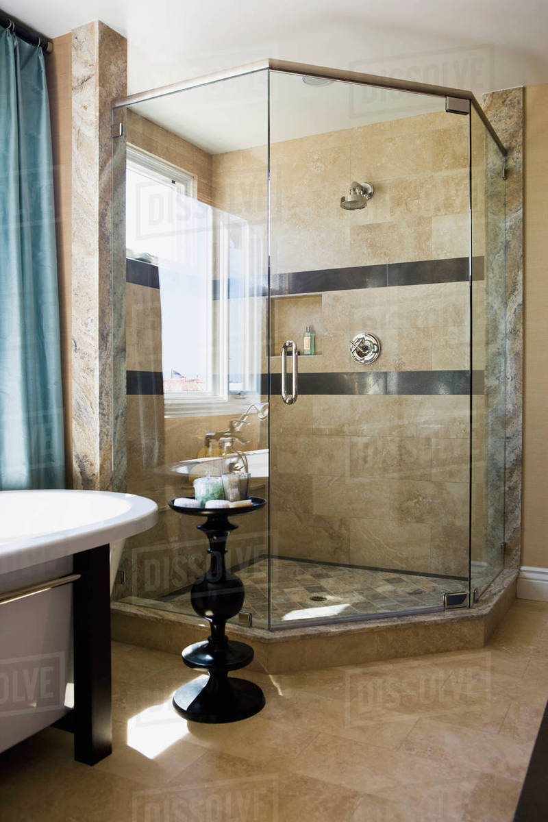 Modern glass shower in corner - Royalty-free Stock Photo | Dissolve