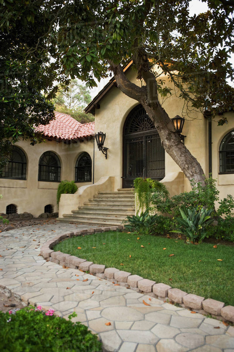Pathway leading to entrance of old spanish home - Royalty-free Stock ...