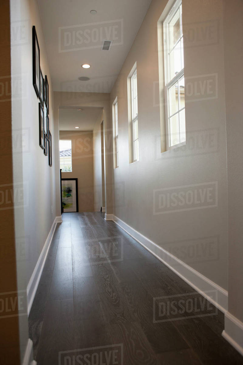 Narrow passageway in average house - Royalty-free Stock Photo | Dissolve