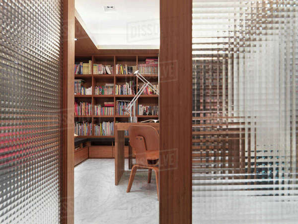 Open translucent doors leading to modern home office - Stock Photo ...