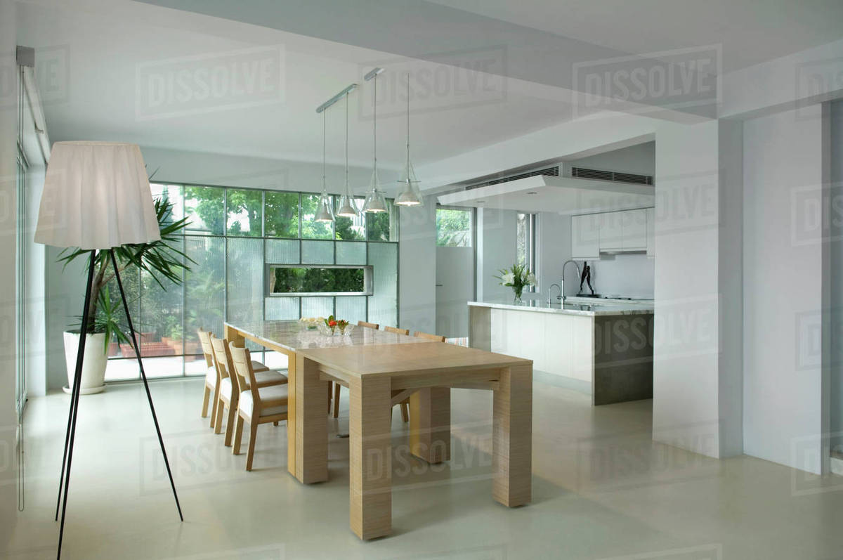 Wooden dining table in modern interior - Royalty-free Stock Photo ...