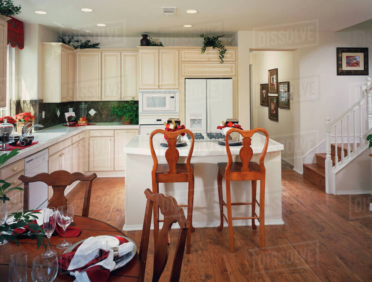 Traditional Kitchen with Island and Dining Table - Stock Photo - Dissolve