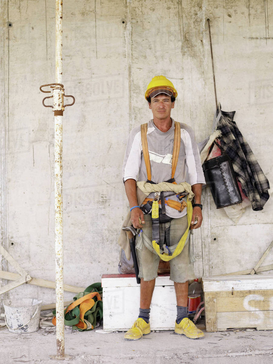 Hispanic worker on construction site - Royalty-free Stock Photo | Dissolve