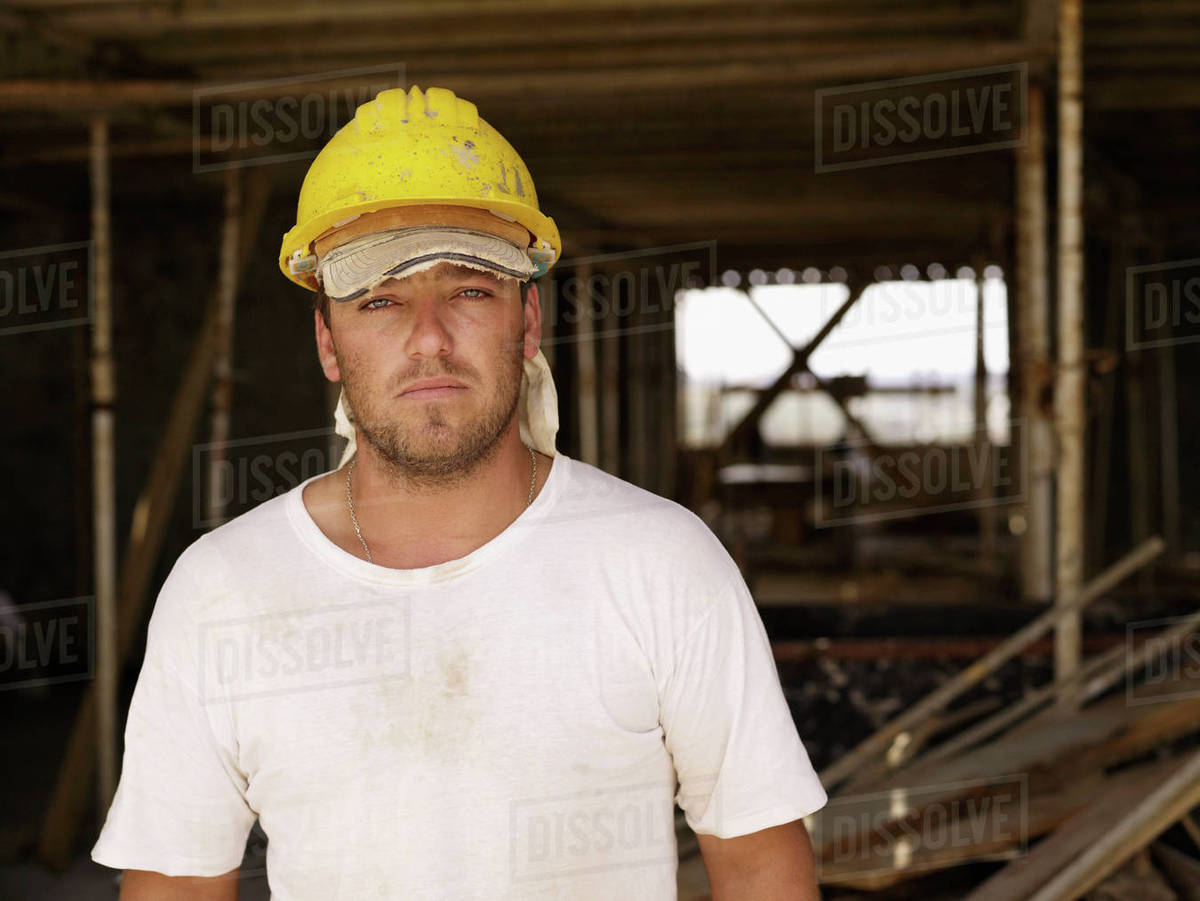 Hispanic worker on construction site - Royalty-free Stock Photo | Dissolve