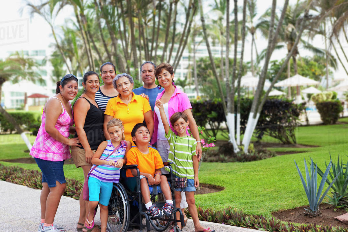 Hispanic family standing together outdoors - Royalty-free Stock Photo ...