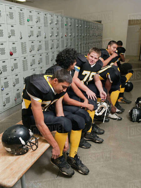 Football players dressing in locker room - Royalty-free Stock Photo ...
