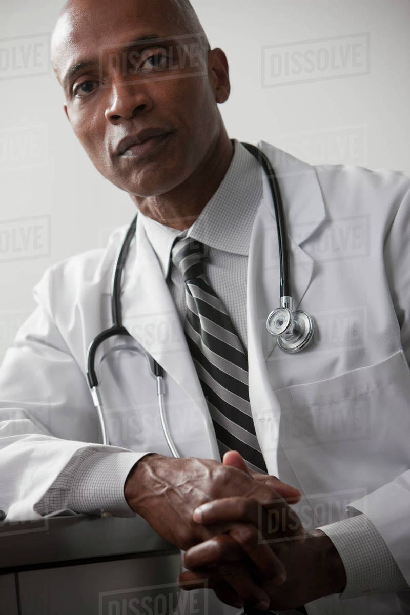 Serious African American doctor - Stock Photo - Dissolve