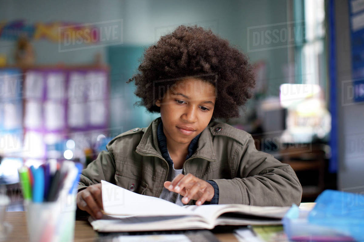 African American boy studying in classroom - Royalty-free Stock Photo ...