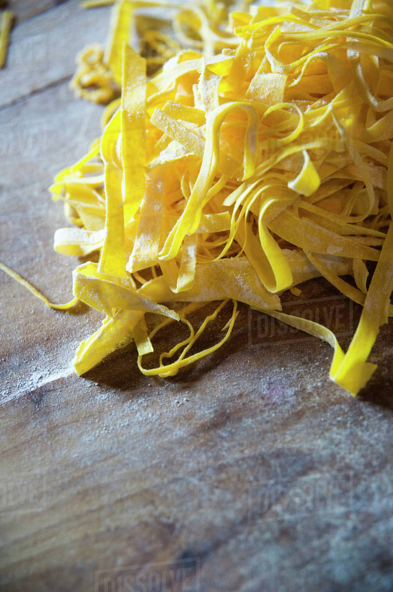Close up of fresh pasta noodles - Royalty-free Stock Photo | Dissolve