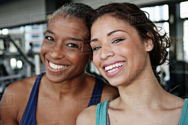 Smiling women in health club - Royalty-free Stock Photo | Dissolve