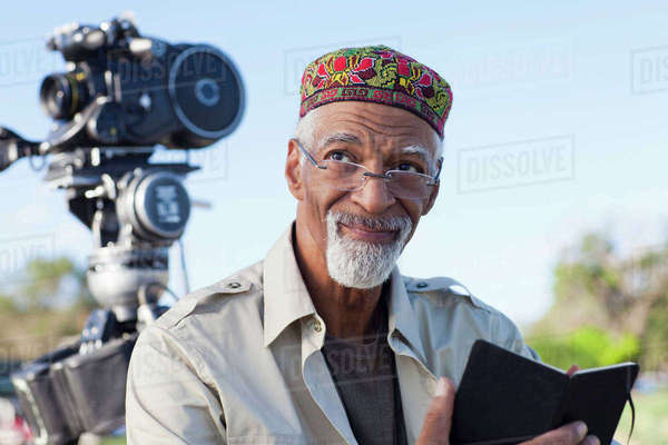 African American director near film camera - Royalty-free Stock Photo ...