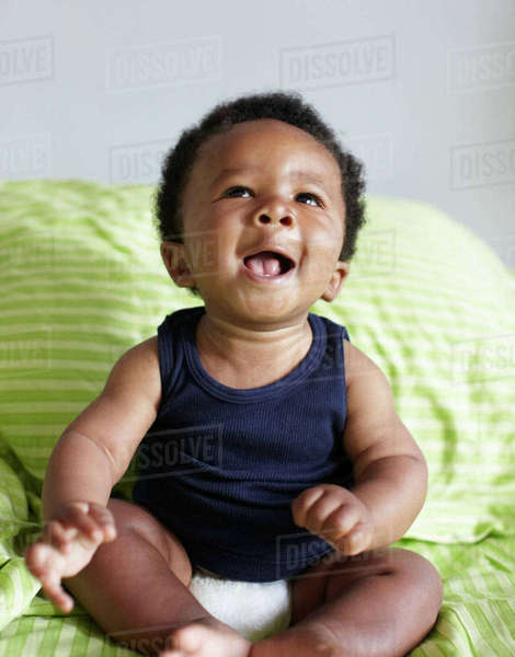 Laughing African American baby - Royalty-free Stock Photo | Dissolve