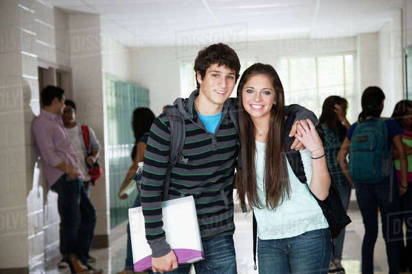 High school friends standing in corridor together - Royalty-free Stock ...