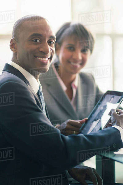 Black business people using tablet computer - Royalty-free Stock Photo ...