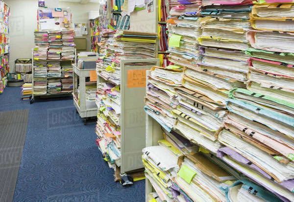 Stacks of papers and folders in library - Royalty-free Stock Photo ...