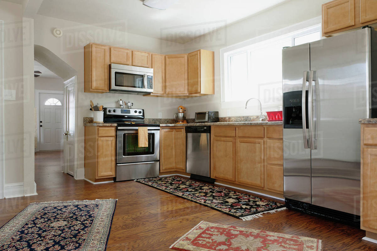 Boxes and cartons stacked in a house - Royalty-free Stock Photo | Dissolve